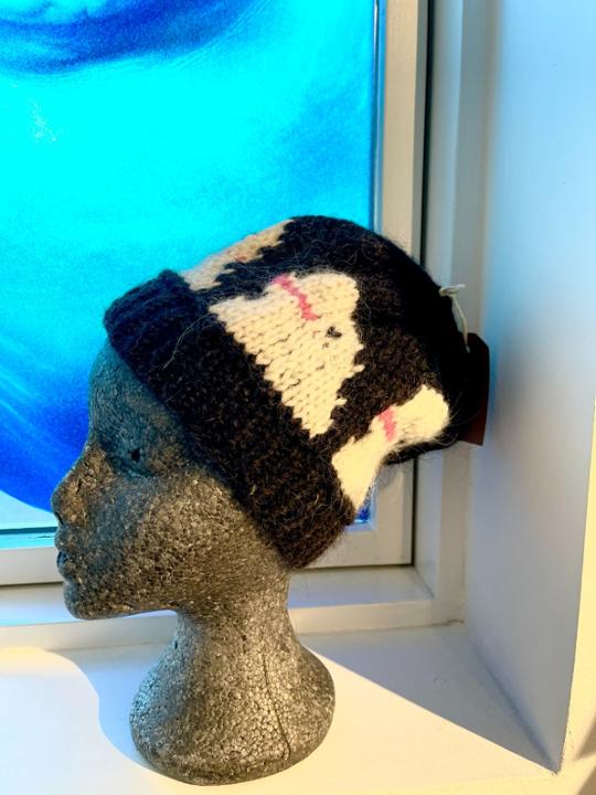 Knitted Beluga Hat | Powered by Givergy