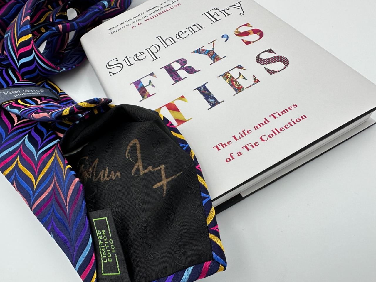 Stephen Fry signed and worn tie + book | Powered by Givergy